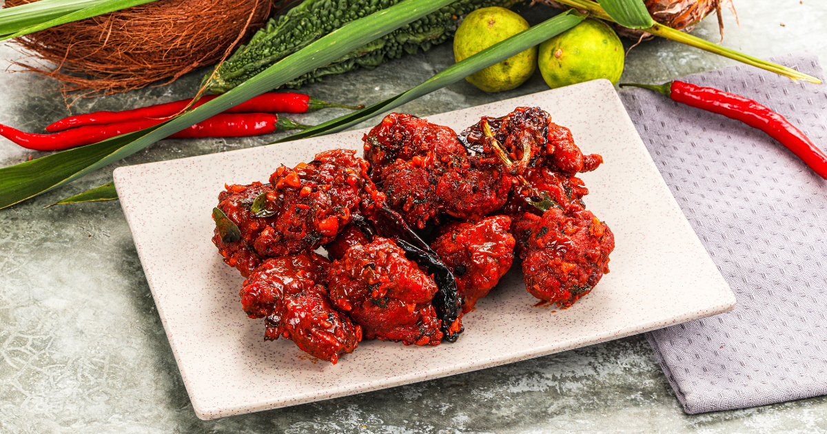 Uncovering the Spicy Origins of Chicken 65 - Swiggy Diaries